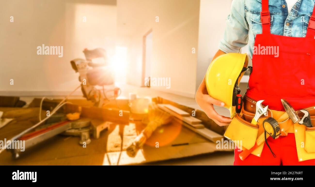 Builder handyman with construction tools. House renovation background ...