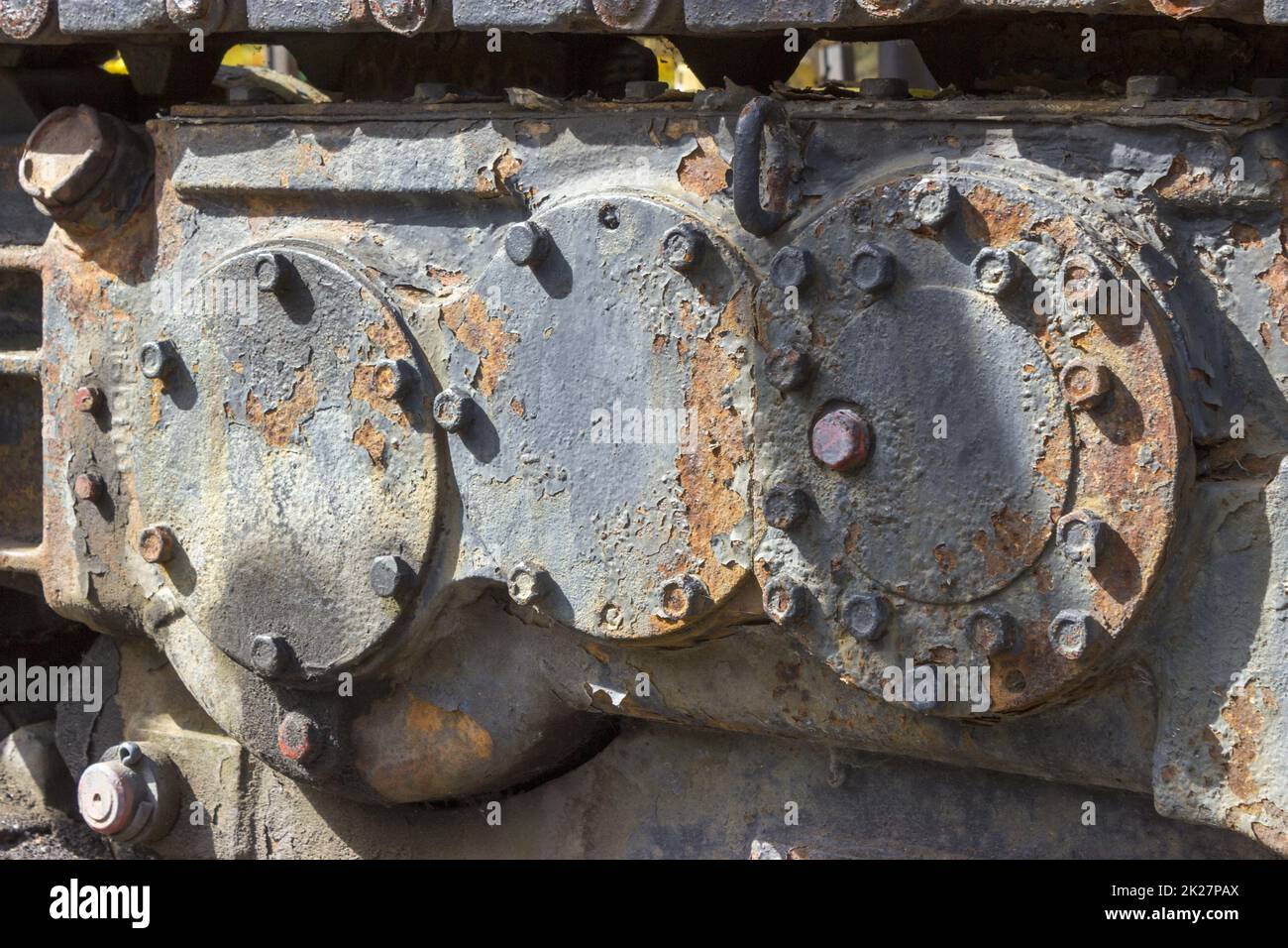 Old rusty skrews on mining machine Stock Photo - Alamy