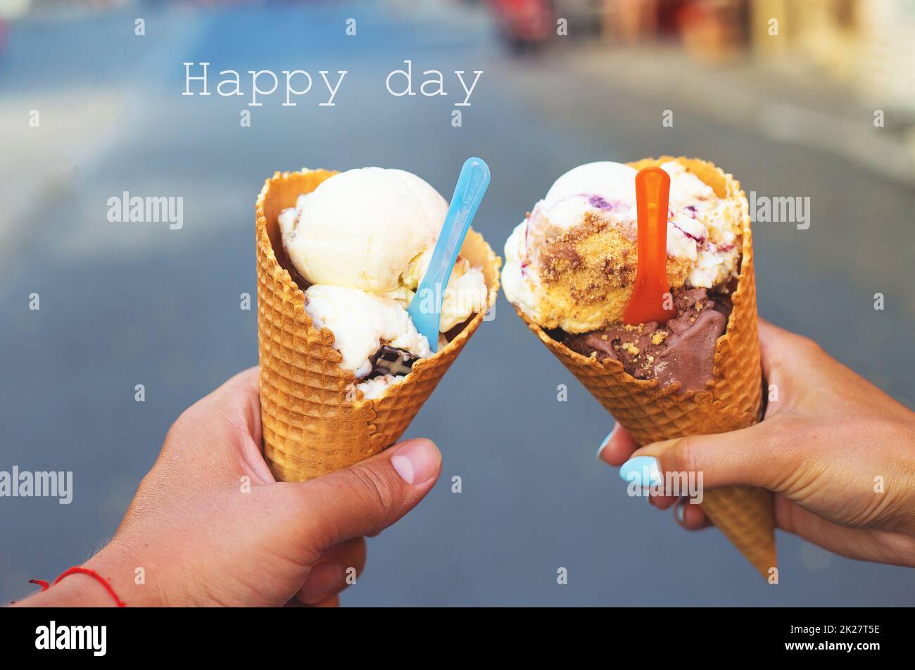 Two flavors in her hand hi-res stock photography and images - Alamy