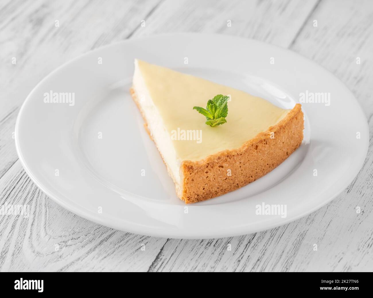 Traditional cheesecake wedge Stock Photo - Alamy