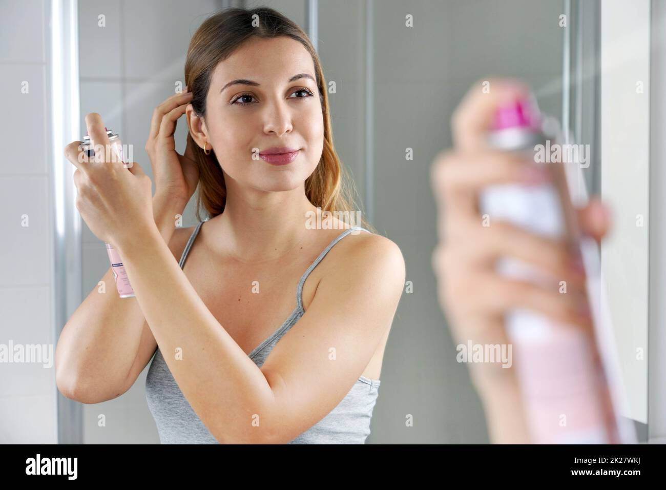 Beauty Woman Applying Dry Shampoo On Her Hair Fast And Easy Way To Keep Hair Clean With Dry