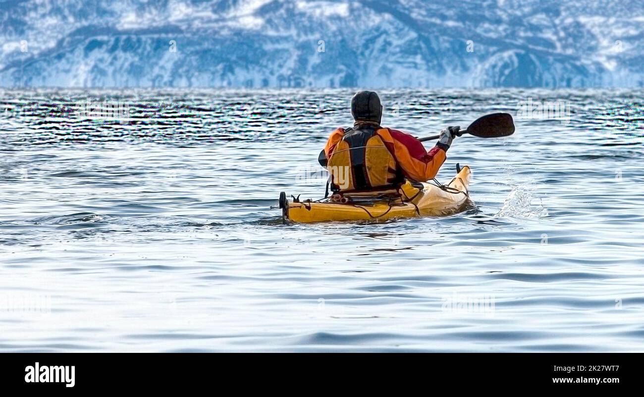 kayaker on a boat in the calm sea on Kamchatka Peninsula Stock Photo ...
