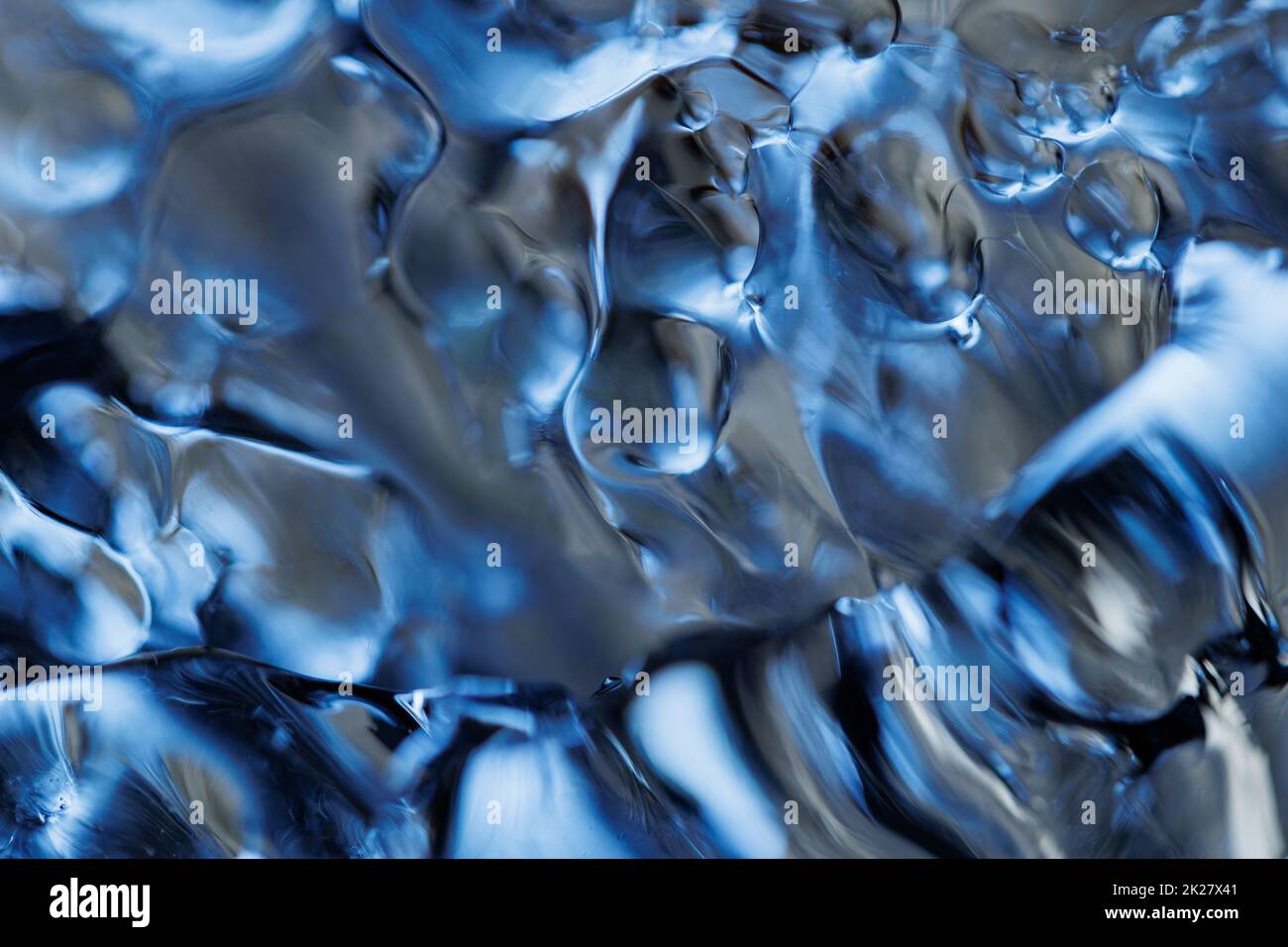 Melting ice water closeup Stock Photo - Alamy