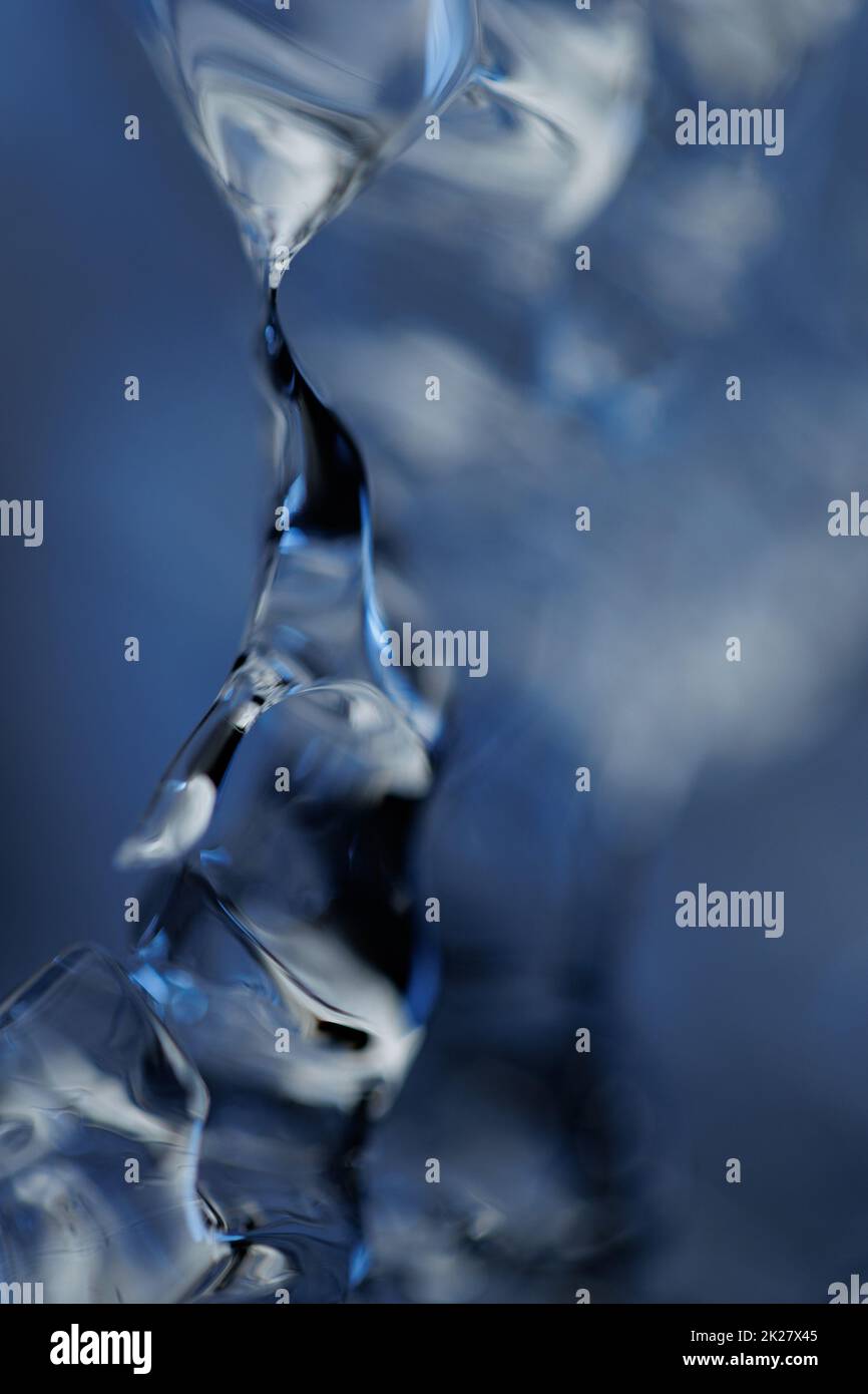 Melting ice water closeup Stock Photo - Alamy