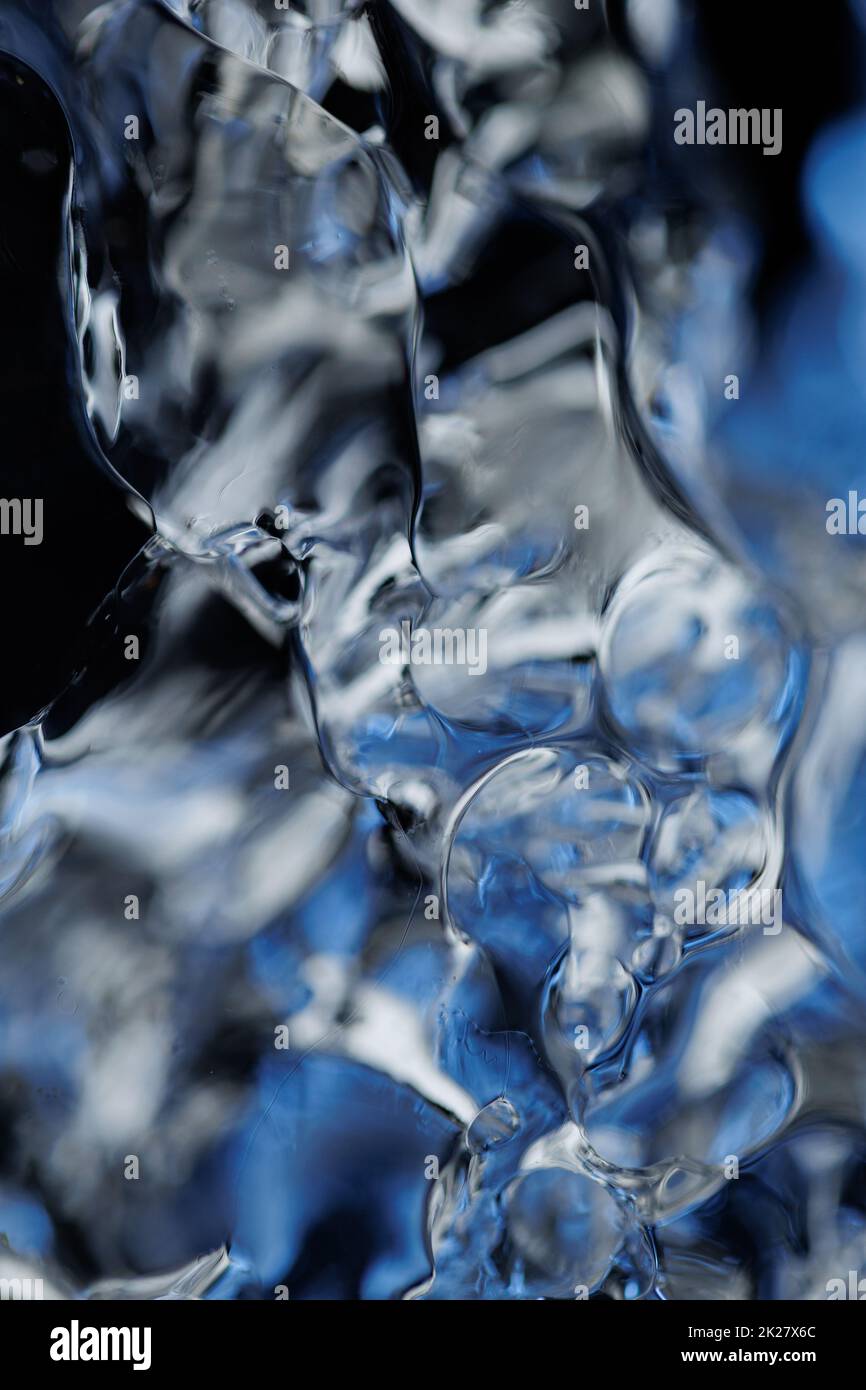 Melting ice water closeup Stock Photo - Alamy