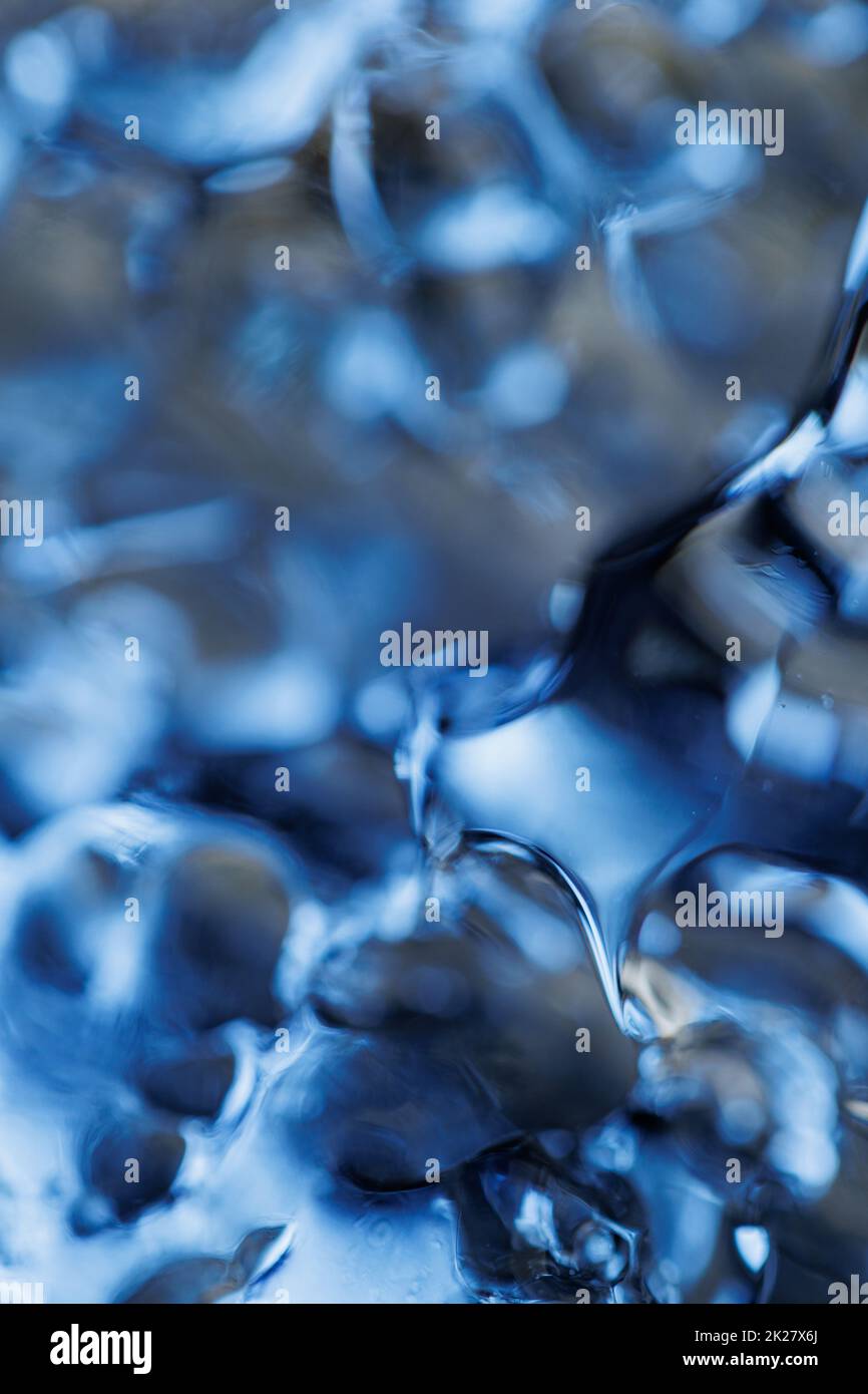 Melting ice water closeup Stock Photo - Alamy