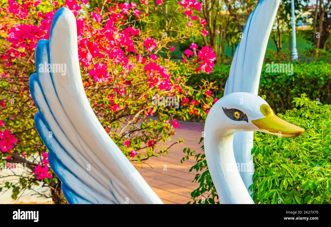Beautiful swan figure in a park in Bangkok Thailand Stock Photo - Alamy