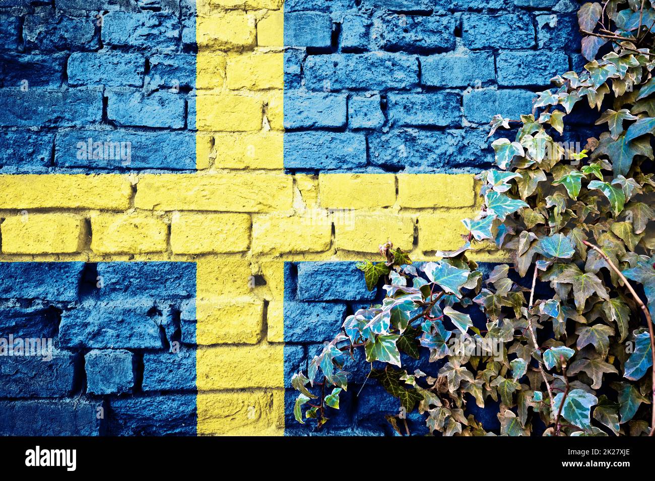 Swedish grunge flag on brick wall with ivy plant Stock Photo - Alamy
