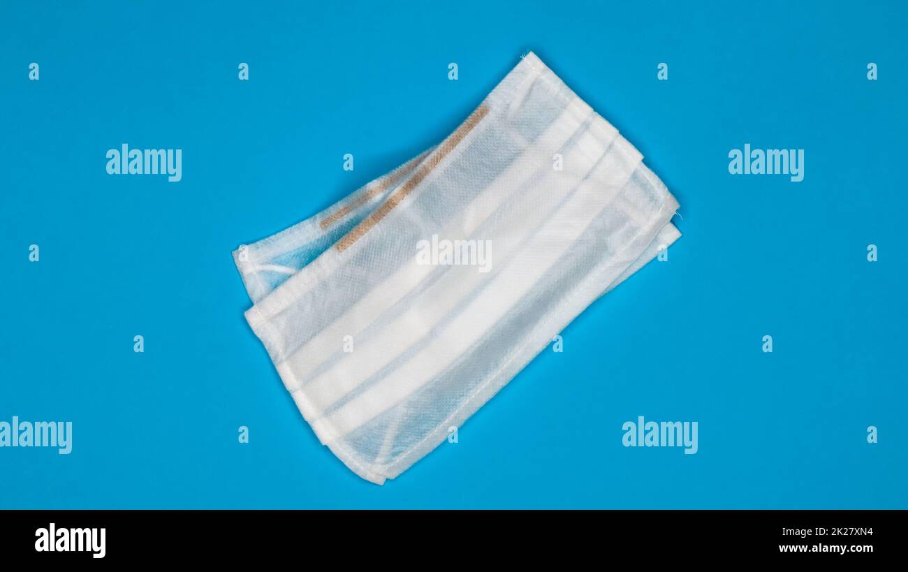 Two three-layer disposable surgical face masks with rubber pads to ...