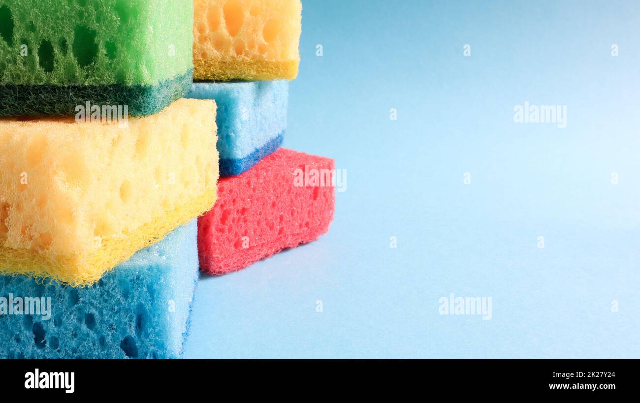 Many blue, red, yellow, green sponges are used to wash and wipe the ...