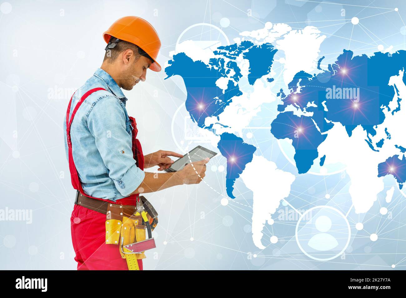 Side view man engineer wearing protective helmet using a tablet ...