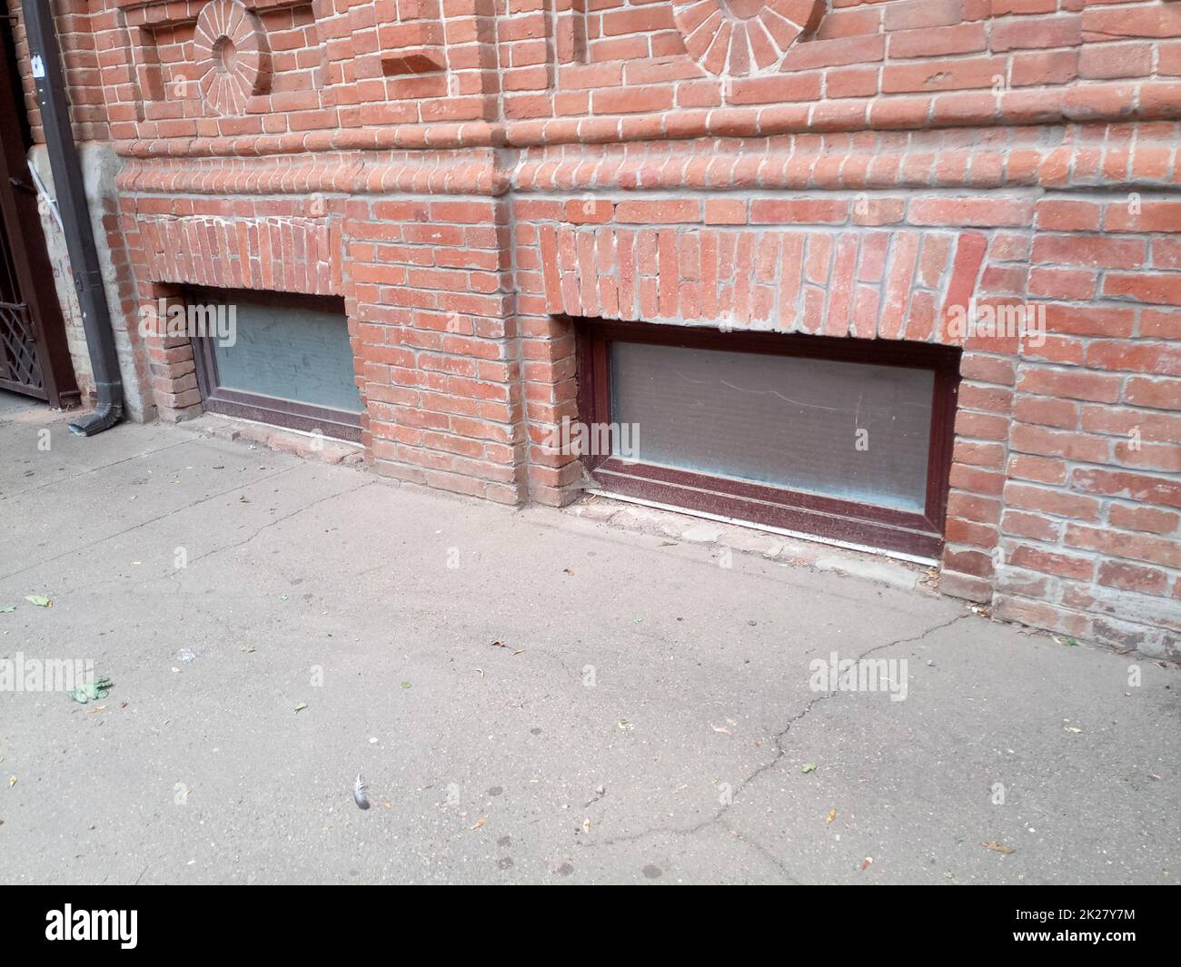 upper part of the window of the ground floor of the building. Recessed ...
