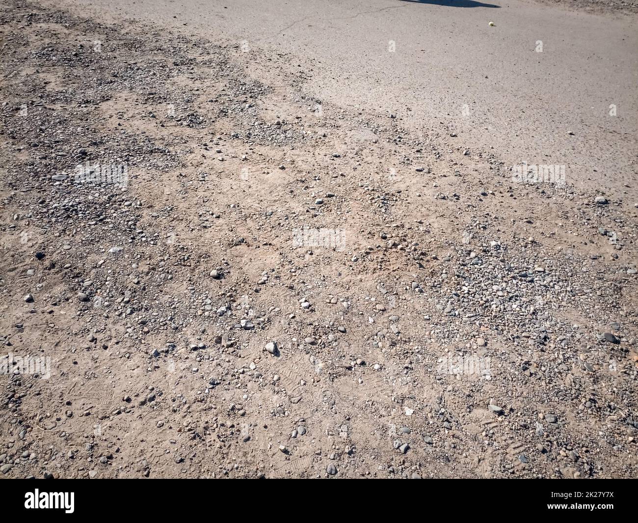 Rubble on the side of the road Stock Photo - Alamy