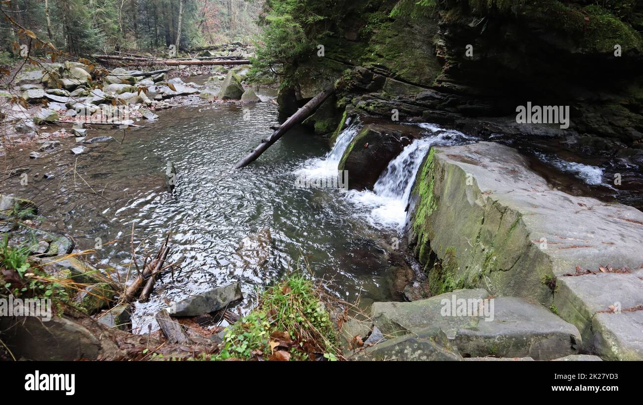 Landscape of a mountain river in the forest in early autumn and late ...