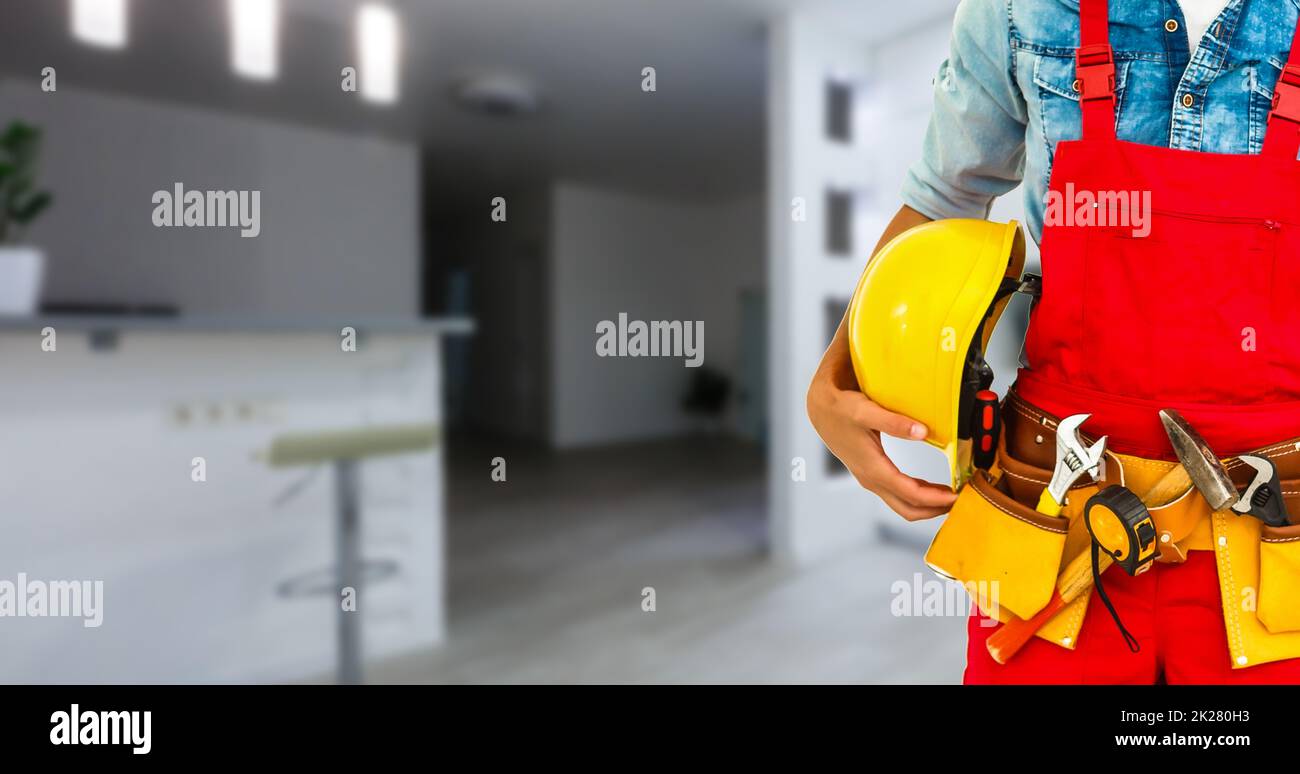 Builder handyman with construction tools. House renovation background ...
