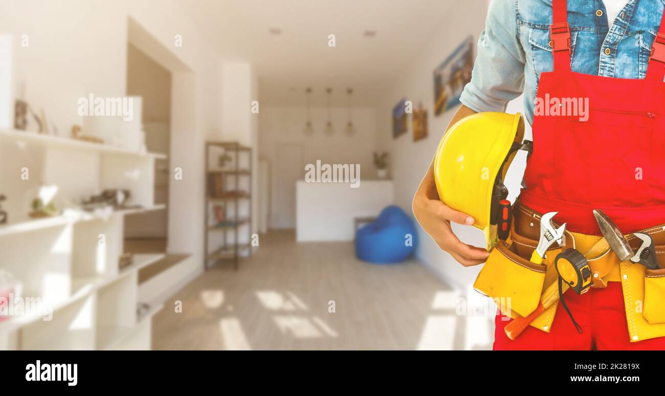 Builder handyman with construction tools. House renovation background ...