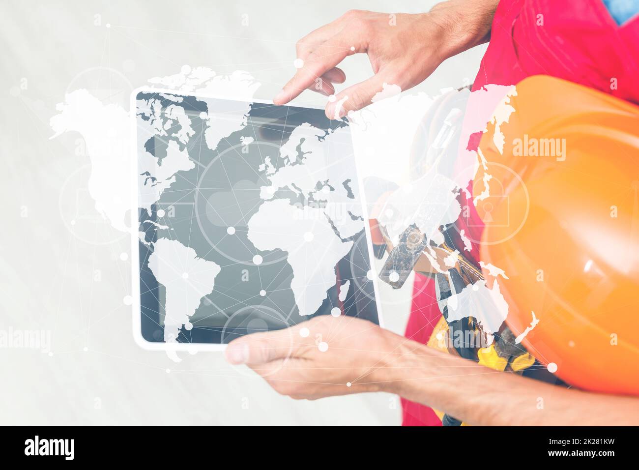 Side view man engineer wearing protective helmet using a tablet ...