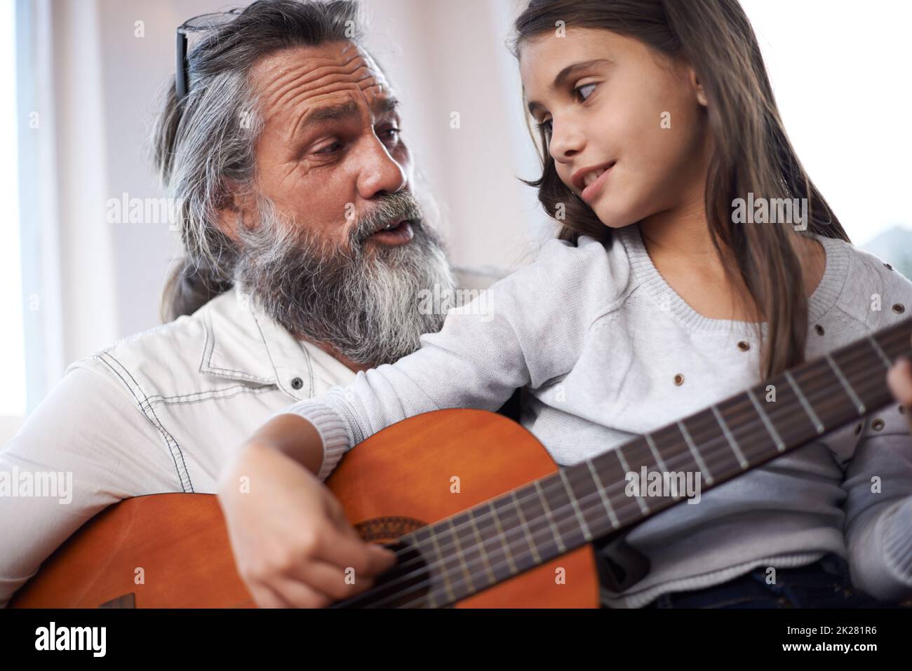 Youre gonna be an amazing guitarist. a little girl playing guitar with ...