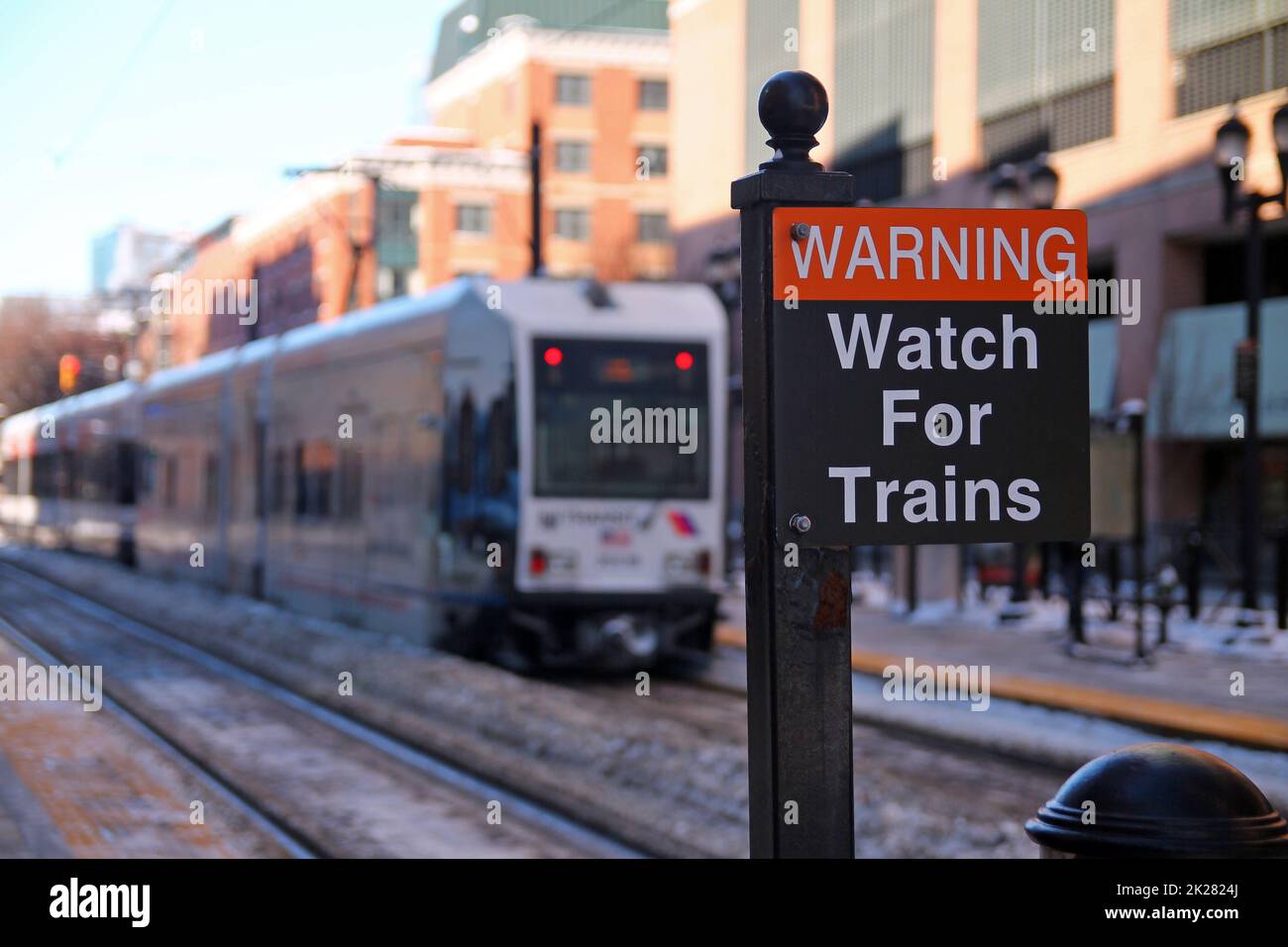 Warning Watch for Trains black and red sign with a streetcar on the ...