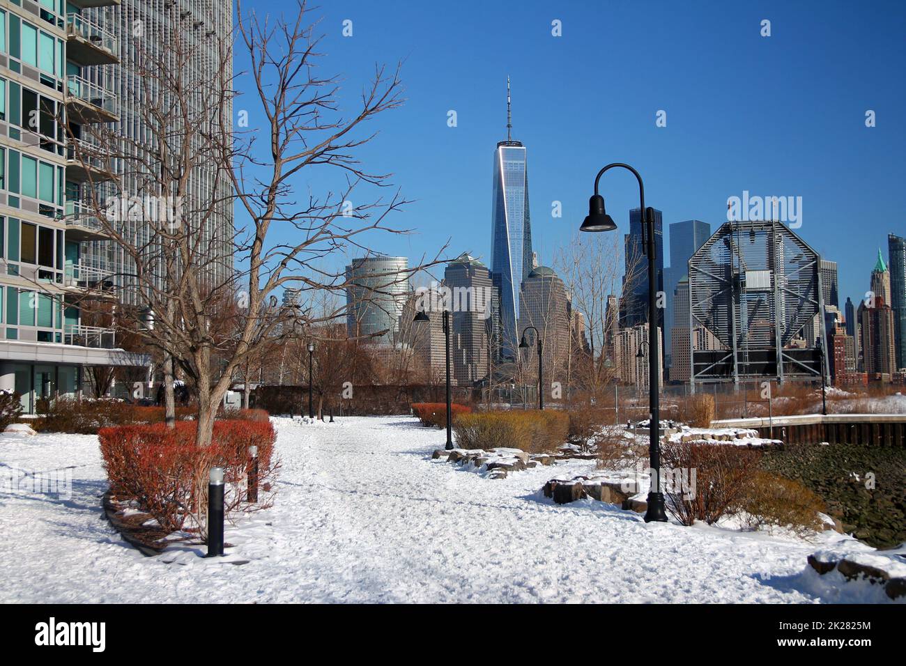 The path in the snow with the skyscrapers of downtown Manhattan Stock ...