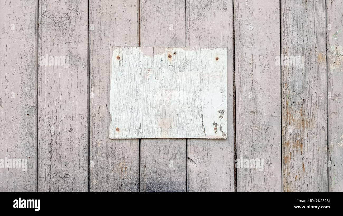Sign boards on a rustic wooden wall mockup. vintage frames on an old ...