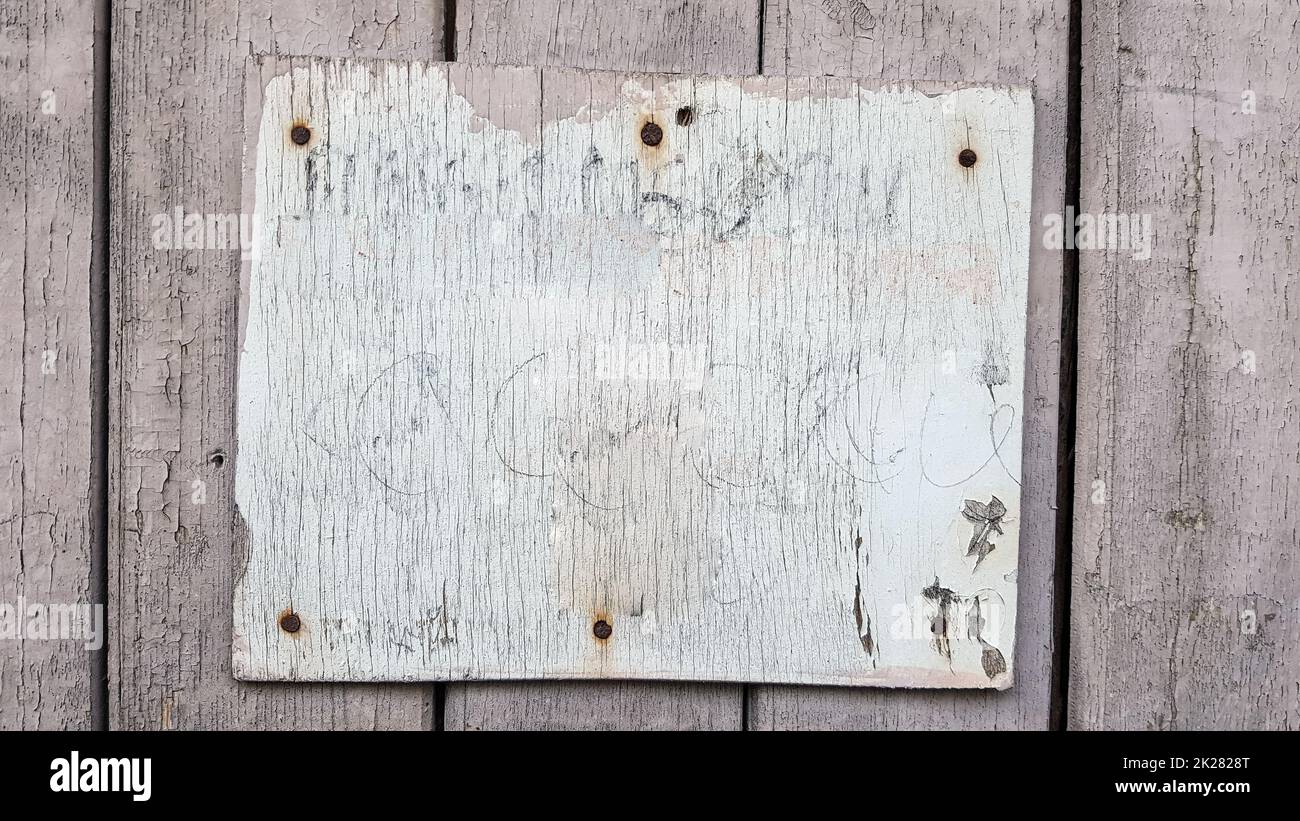 Sign boards on a rustic wooden wall mockup. vintage frames on an old ...