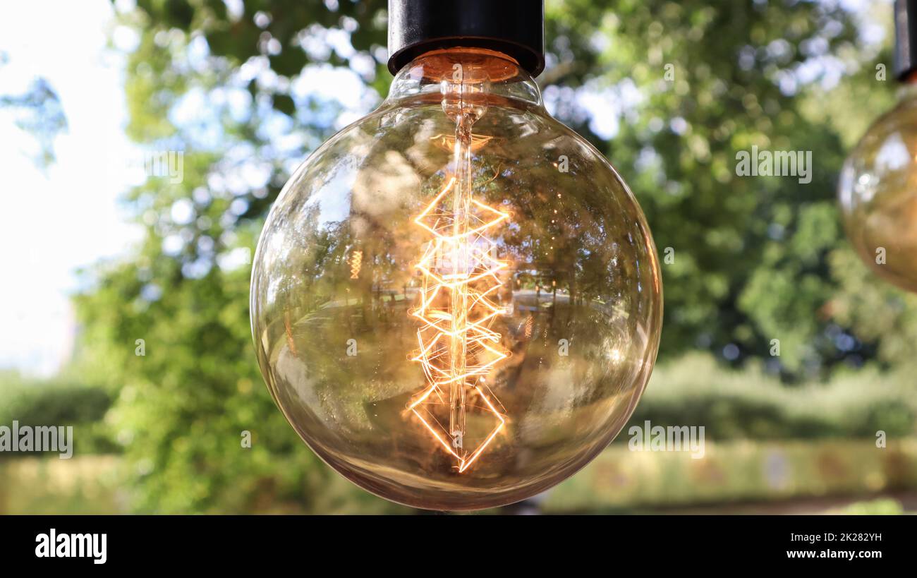 Edison incandescent bulbs hang in a retro loft style. Cafeteria ...