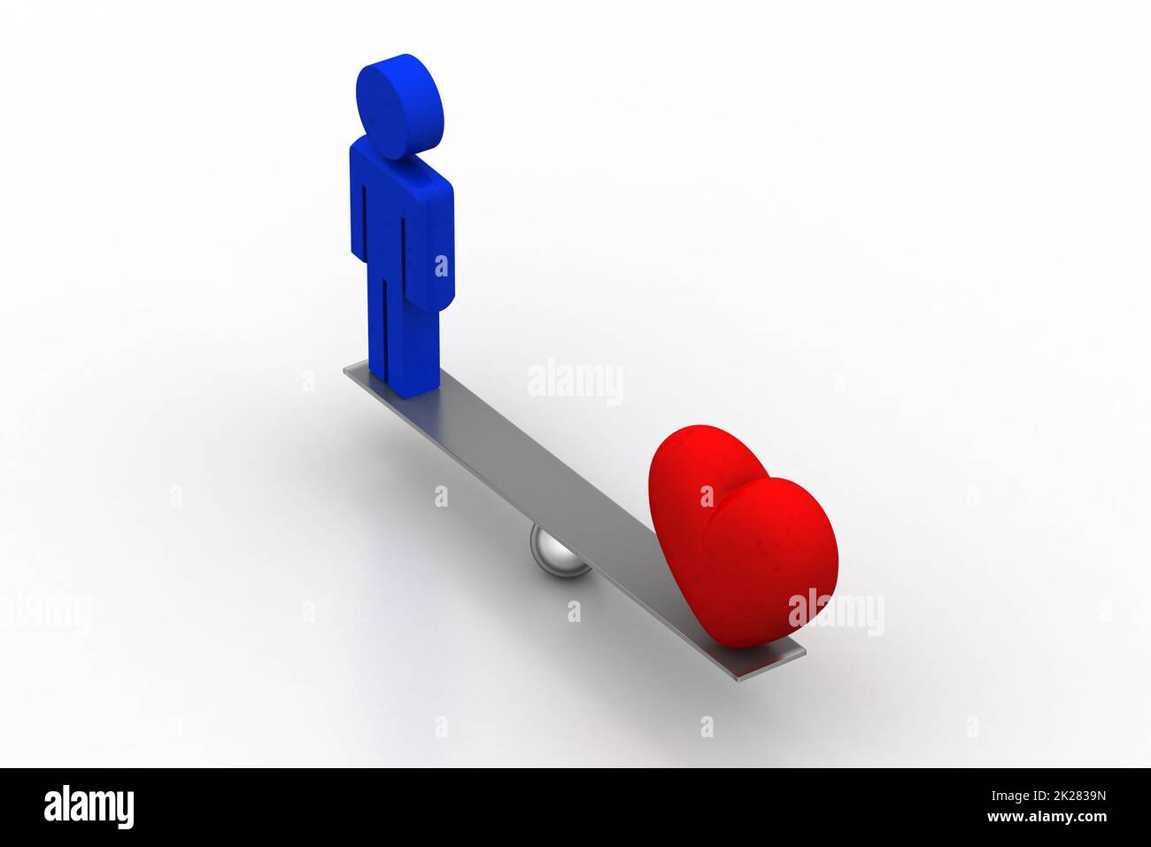 Love heart sign balancing with man Stock Photo - Alamy