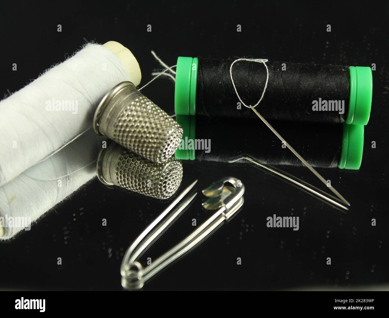 Sewing Needle thread scissors thimble tailor buttons Stock Photo - Alamy