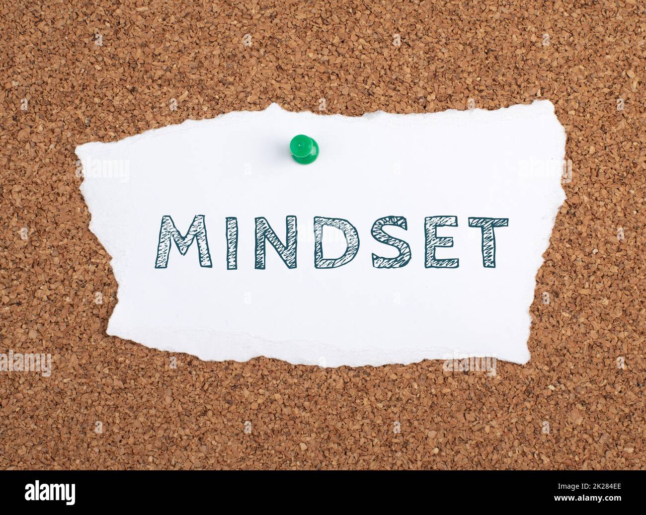 The word mindest is standing on a paper, pin board, coaching concept ...