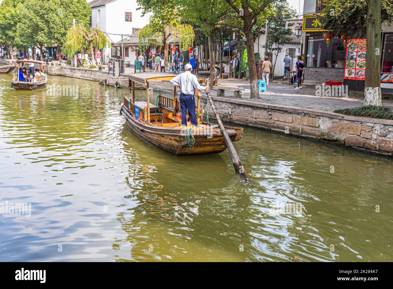 Water taxi on the Dong shi river in the ancient town of Zhujiajiao ...