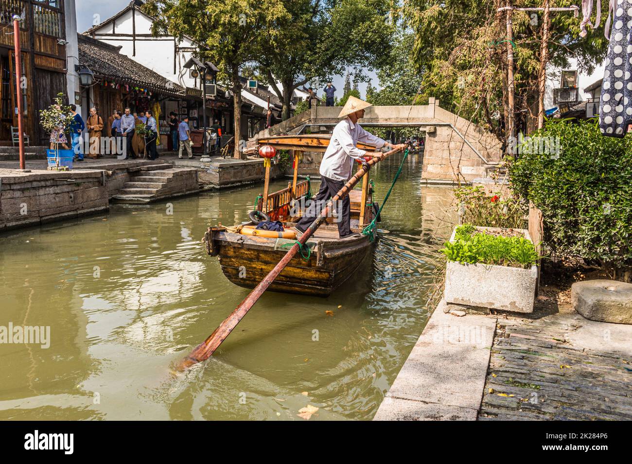 Water taxi on the Dong shi river in the ancient town of Zhujiajiao ...