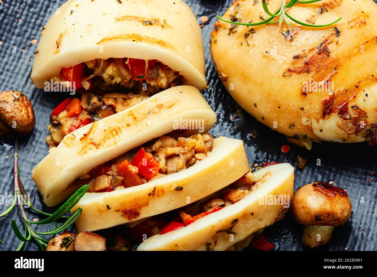 Grilled squid with mushroom stuffing Stock Photo - Alamy