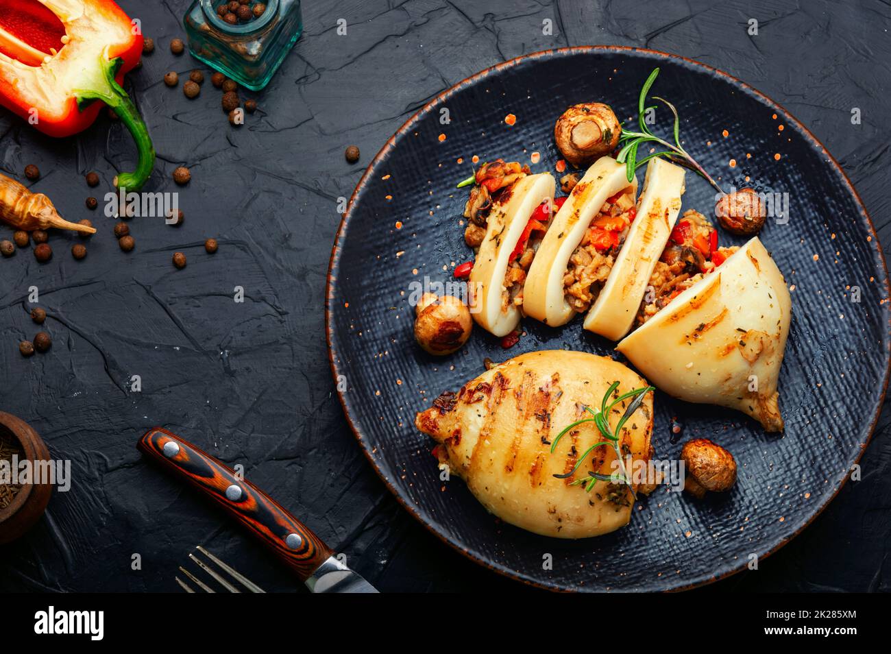 Grilled squid with mushroom stuffing Stock Photo - Alamy