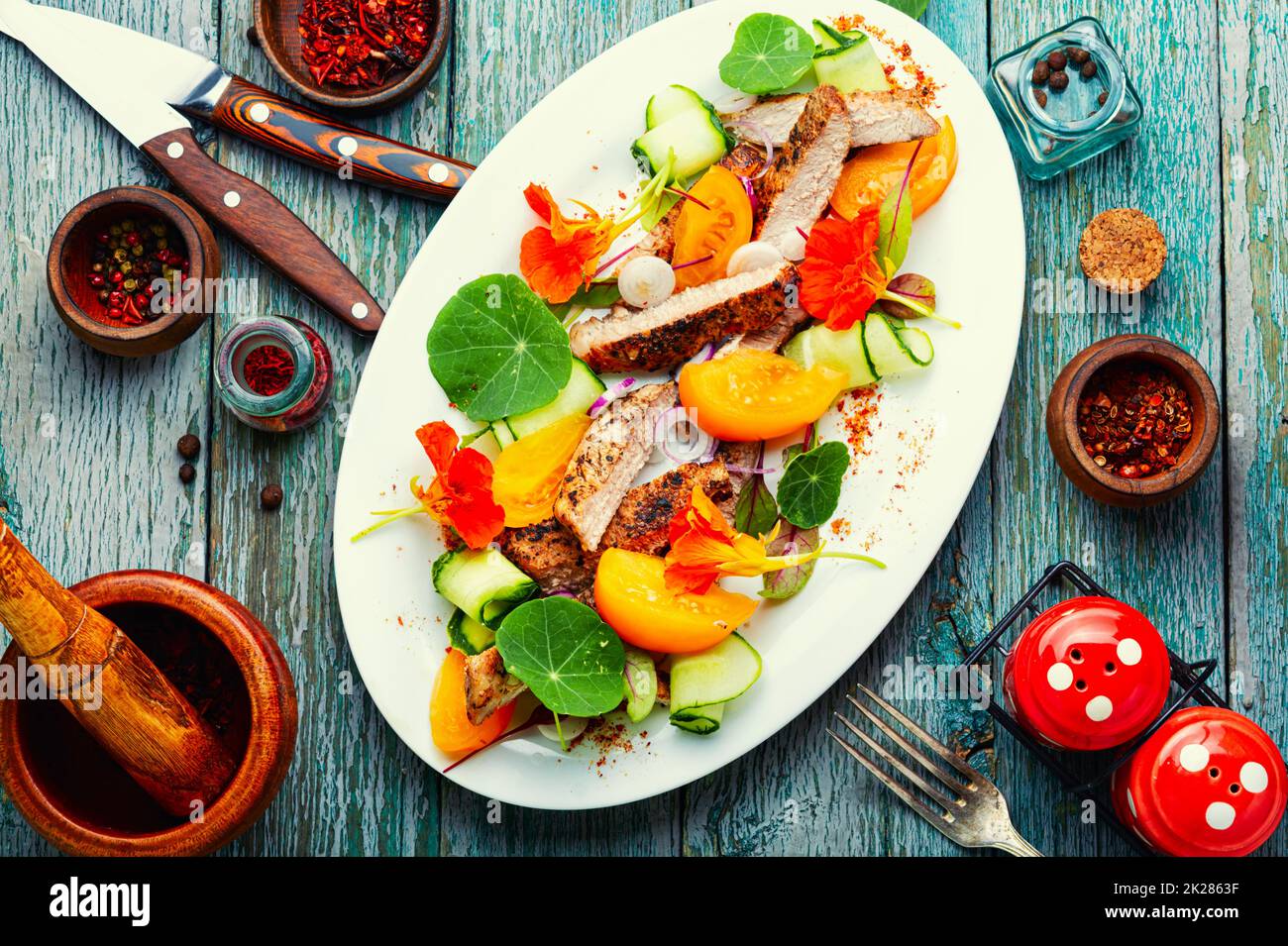 Bright salad with meat steak Stock Photo - Alamy