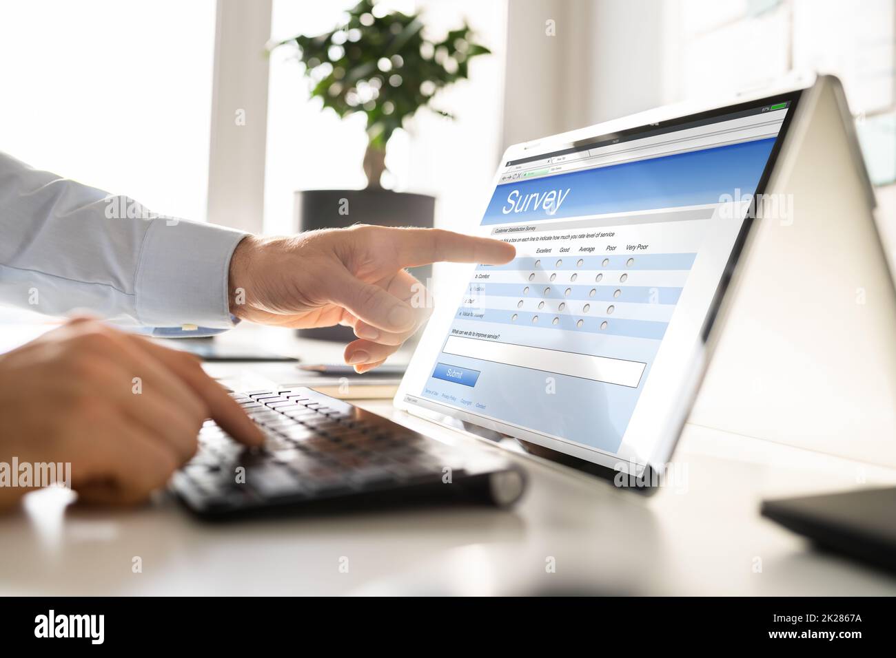 Man giving online survey hi-res stock photography and images - Alamy