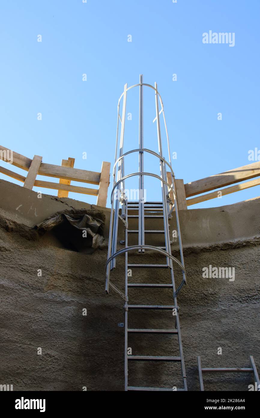 Safety bracket on a ladder in an excavation Stock Photo - Alamy