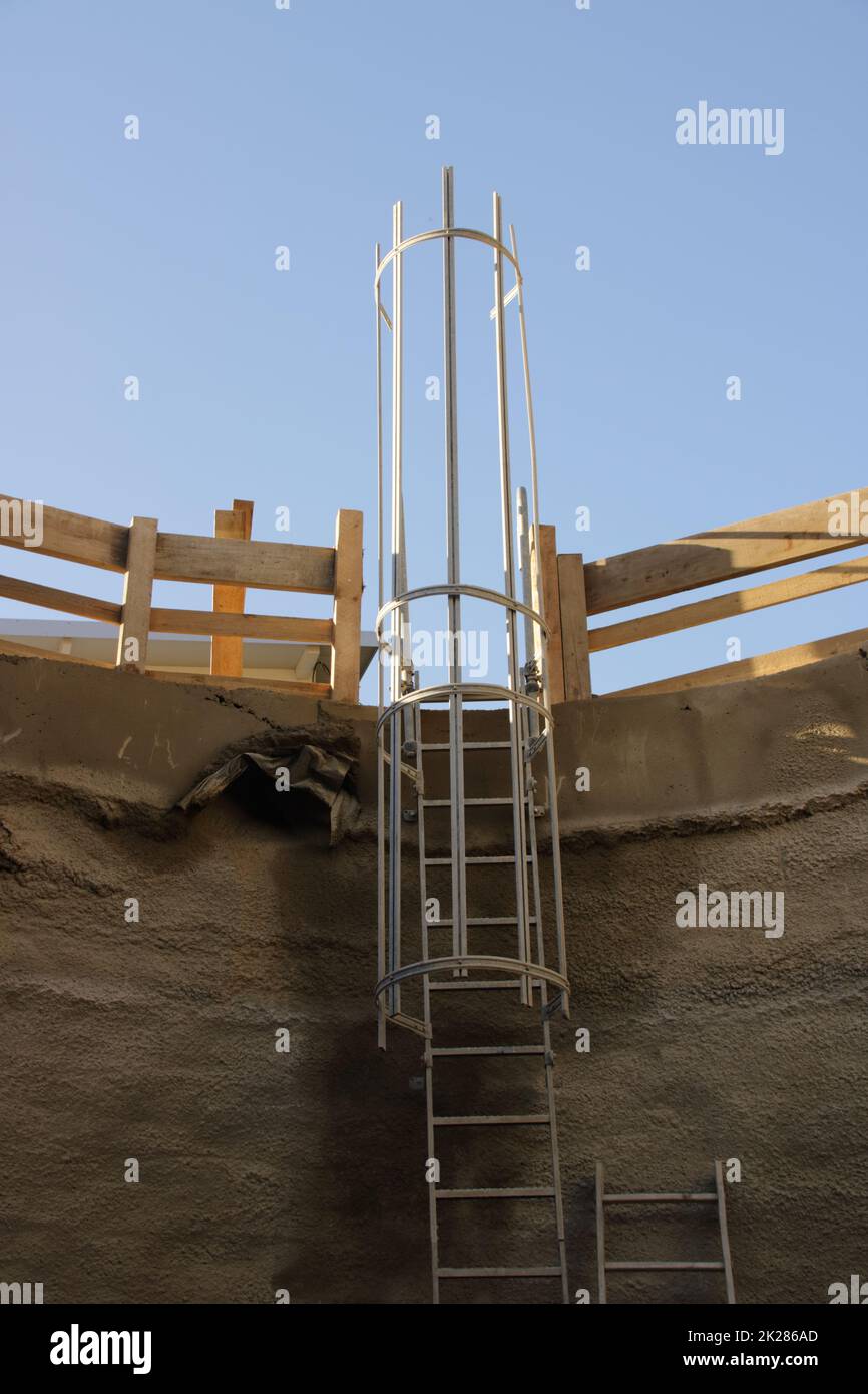 Safety bracket on a ladder in an excavation Stock Photo - Alamy