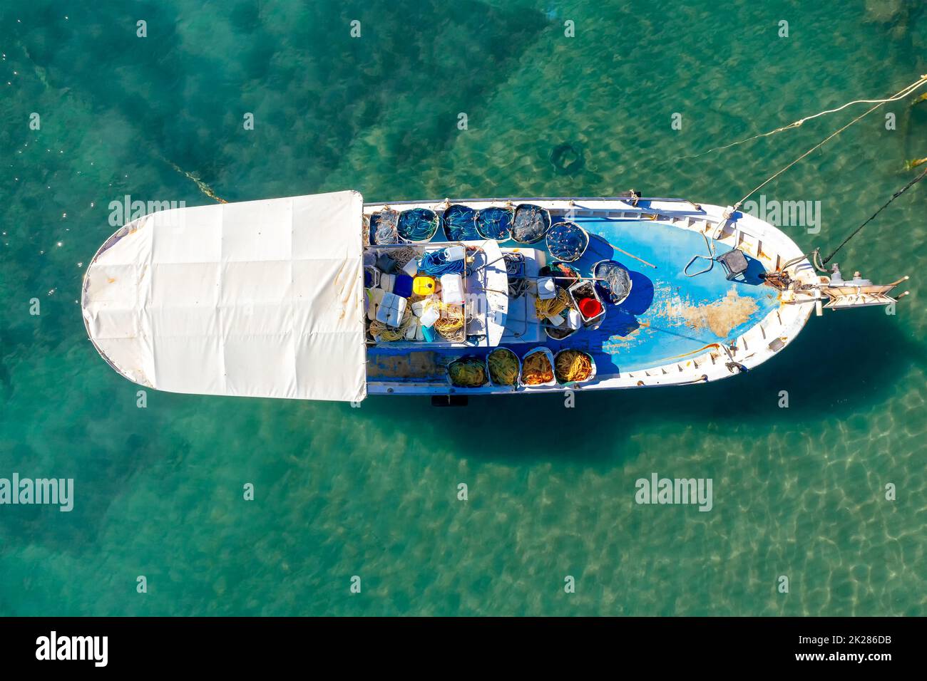 Top down view of a fisherman's boat loaded with nets Stock Photo - Alamy