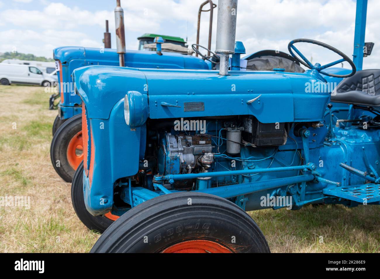 West Bay.Dorset.United Kingdom.June 12th 2022.Restored Fordson Majors ...