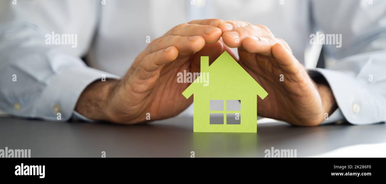 House Insurance Cover And Security Stock Photo - Alamy