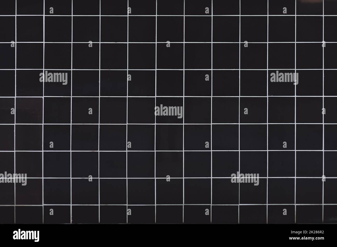 Black tile texture with white seams Stock Photo - Alamy