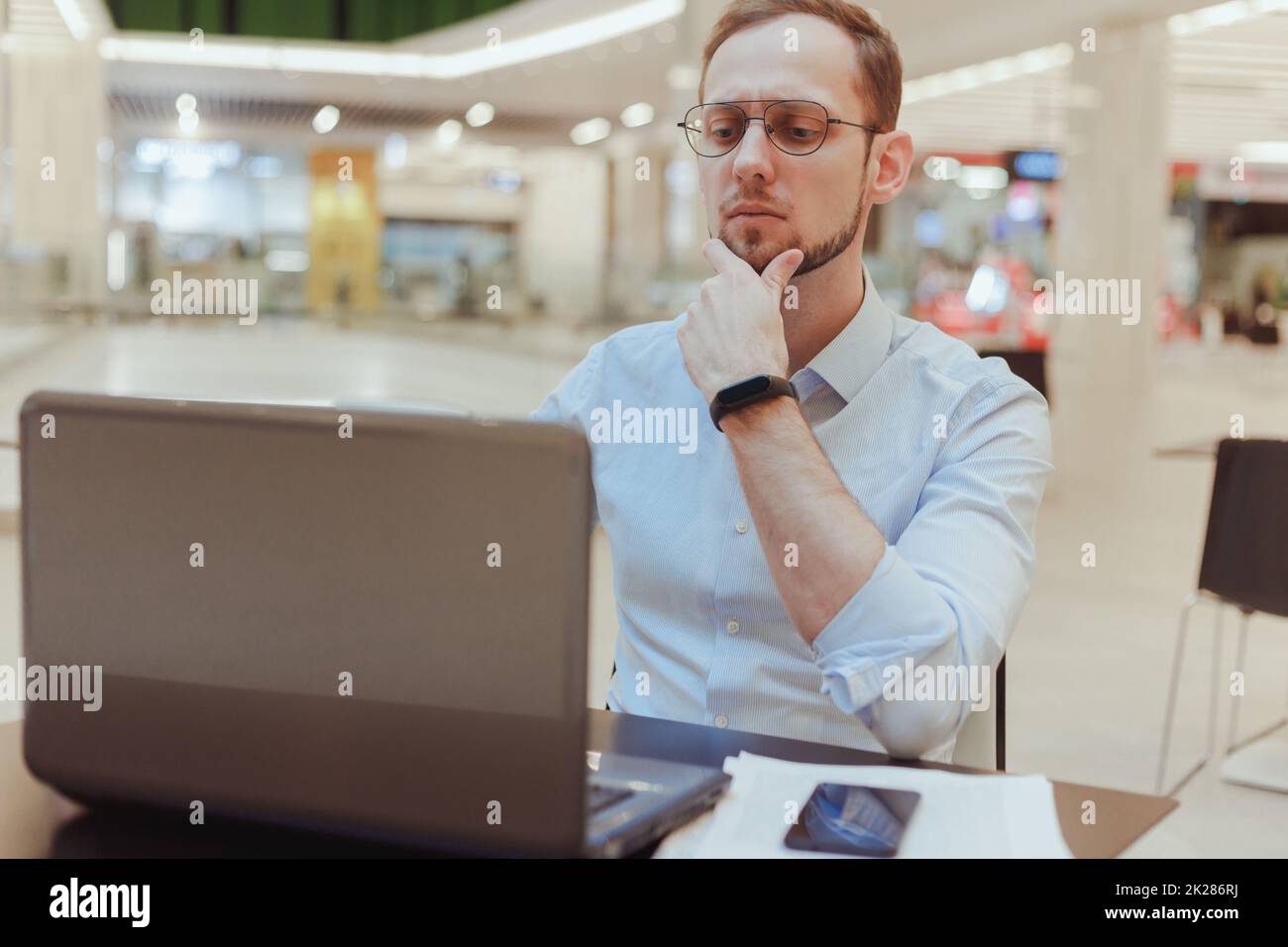 Pondering employee thinking ideas working hi-res stock photography and ...