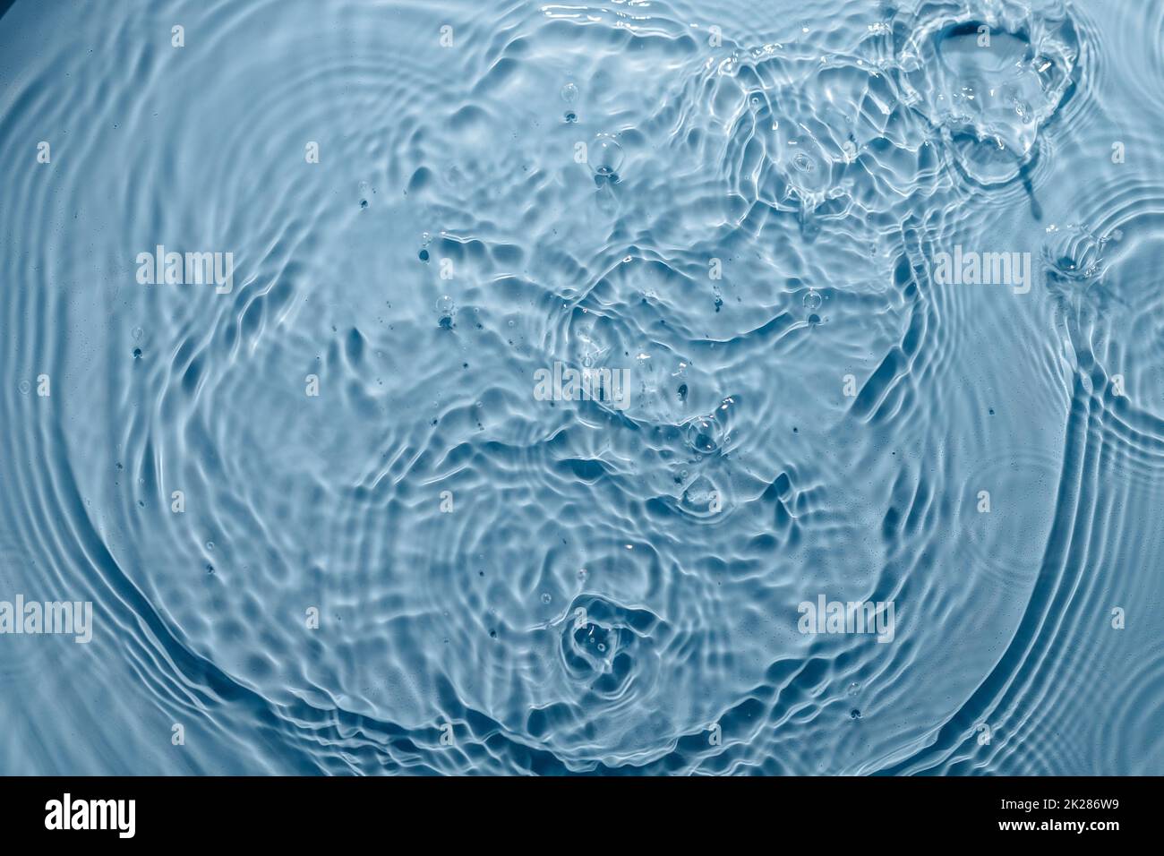 Blue water texture, blue pure water surface with waves and ripples ...