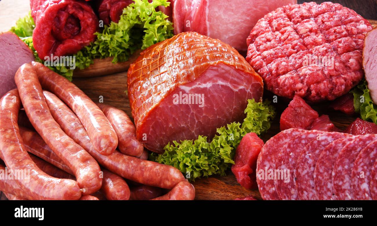 Composition with assorted meat products Stock Photo - Alamy