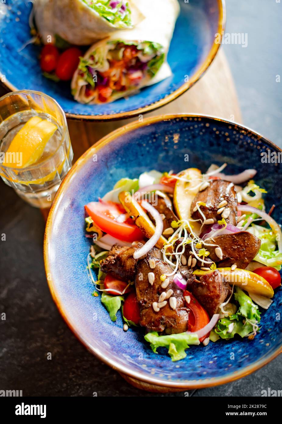 Vegetable salad with cooked pork and tortilla Stock Photo - Alamy