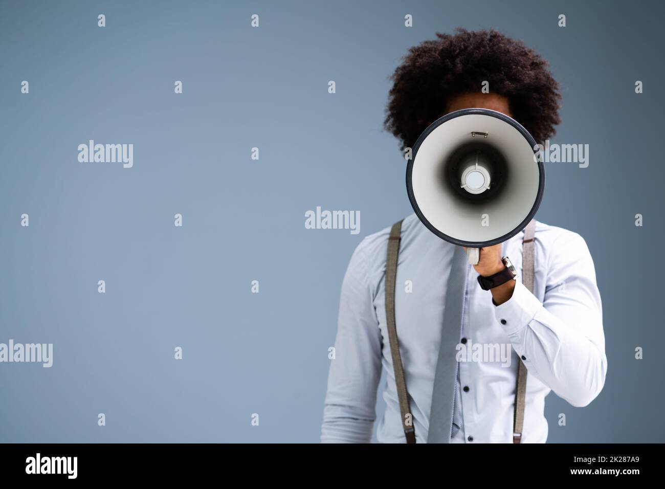 Black man holding megaphone hi-res stock photography and images - Alamy