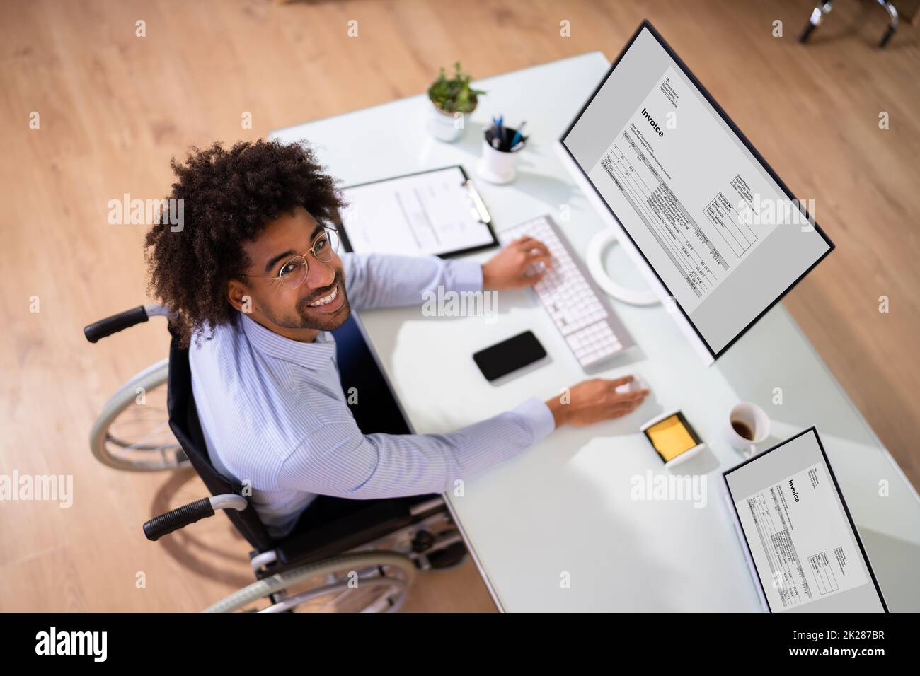 Disable man working office hi-res stock photography and images - Alamy