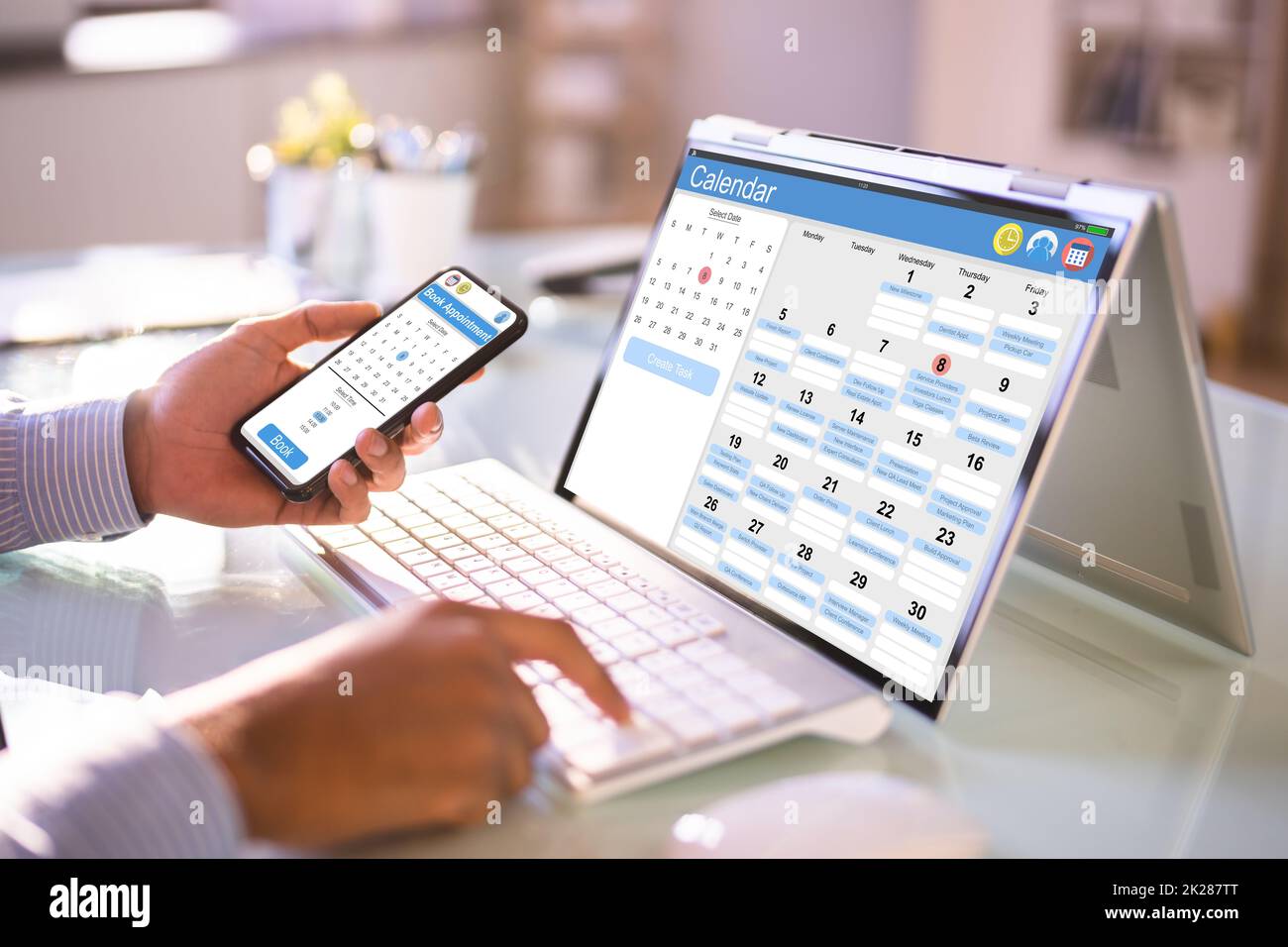 Man Looking At Month Agenda In Calendar Stock Photo - Alamy