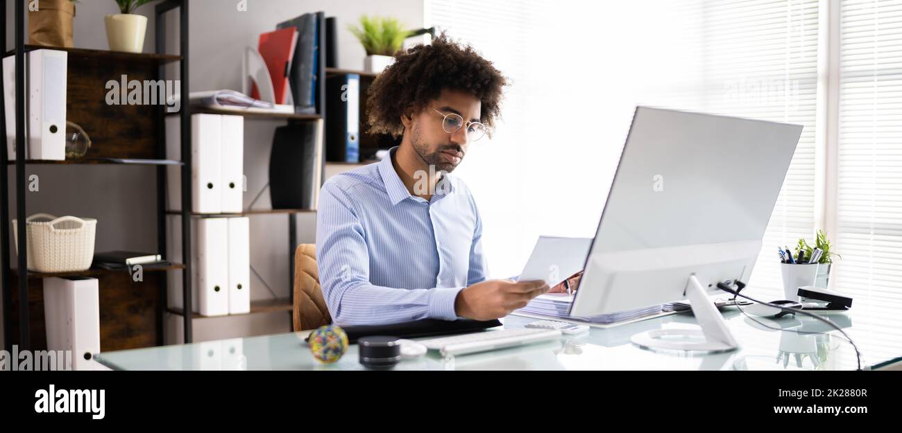 Accounting Bookkeeper Clerk Man. Bank Advisor Stock Photo - Alamy